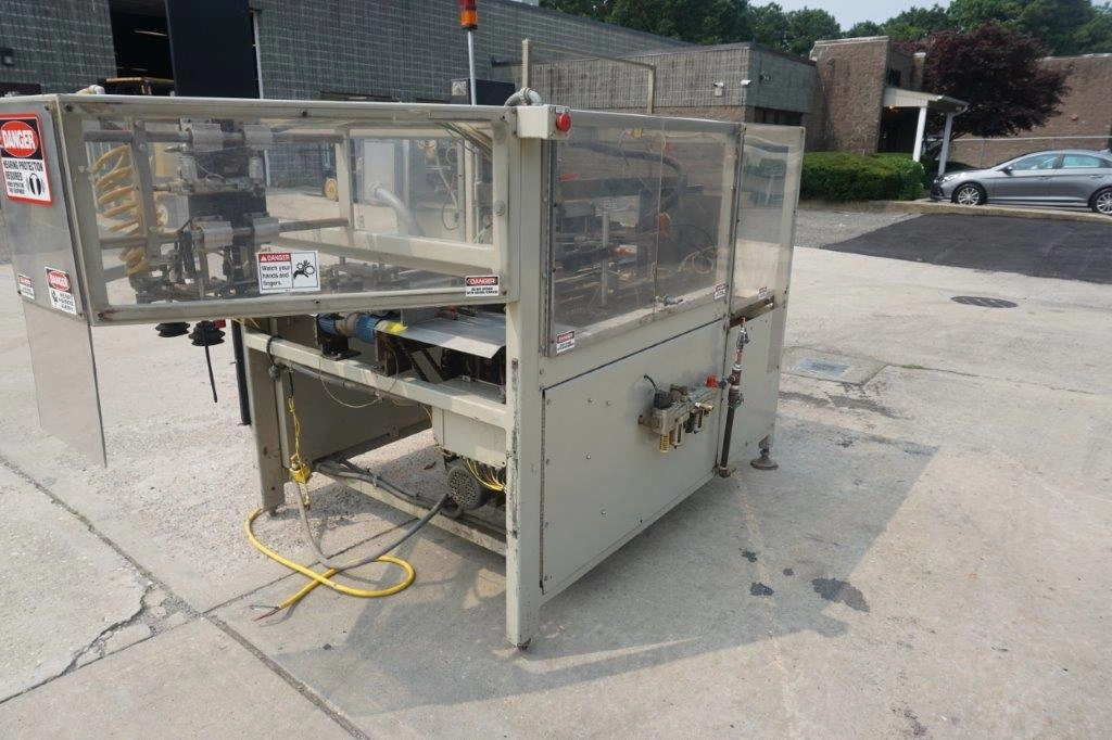 Packo-Matic Case Packaging Machine, Nordson Gluing | LabX.com