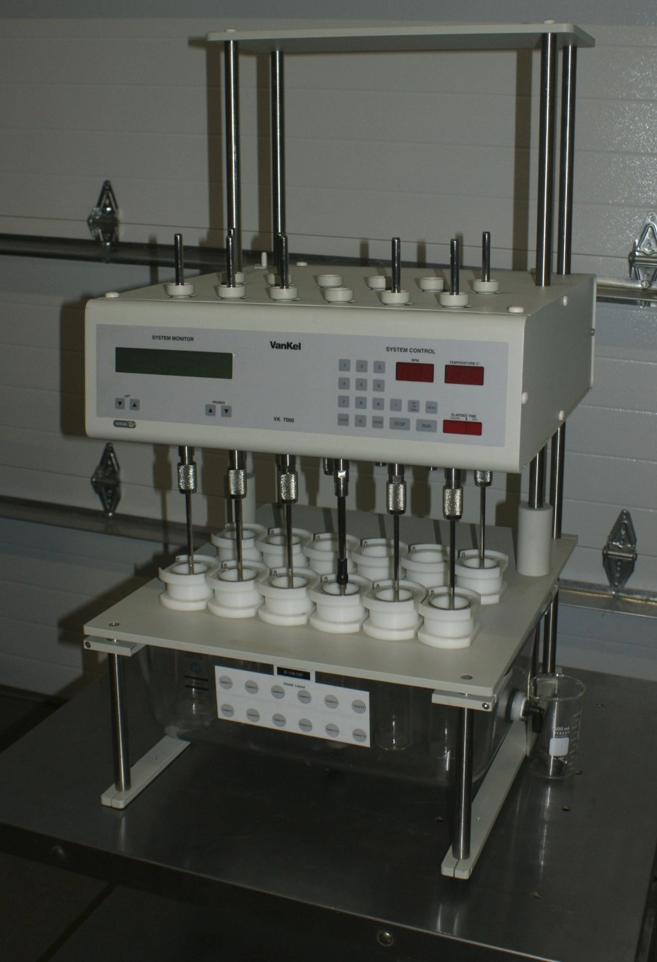 Varian Vankel VK- 7000 P/N 10-5000 System that is a 12 Position Dissolution System with 750D ...
