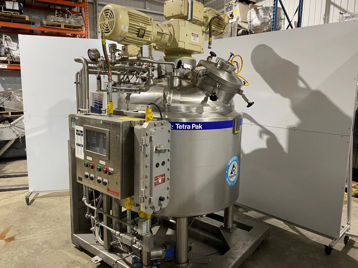 Used 1000L Tetrapak jacketed tank with mixer and explosion proof ...