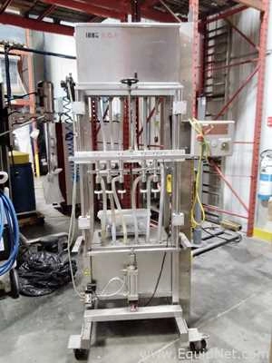 Capmatic 6 Head Flowmatic Inline Gravity Filler | LabX.com