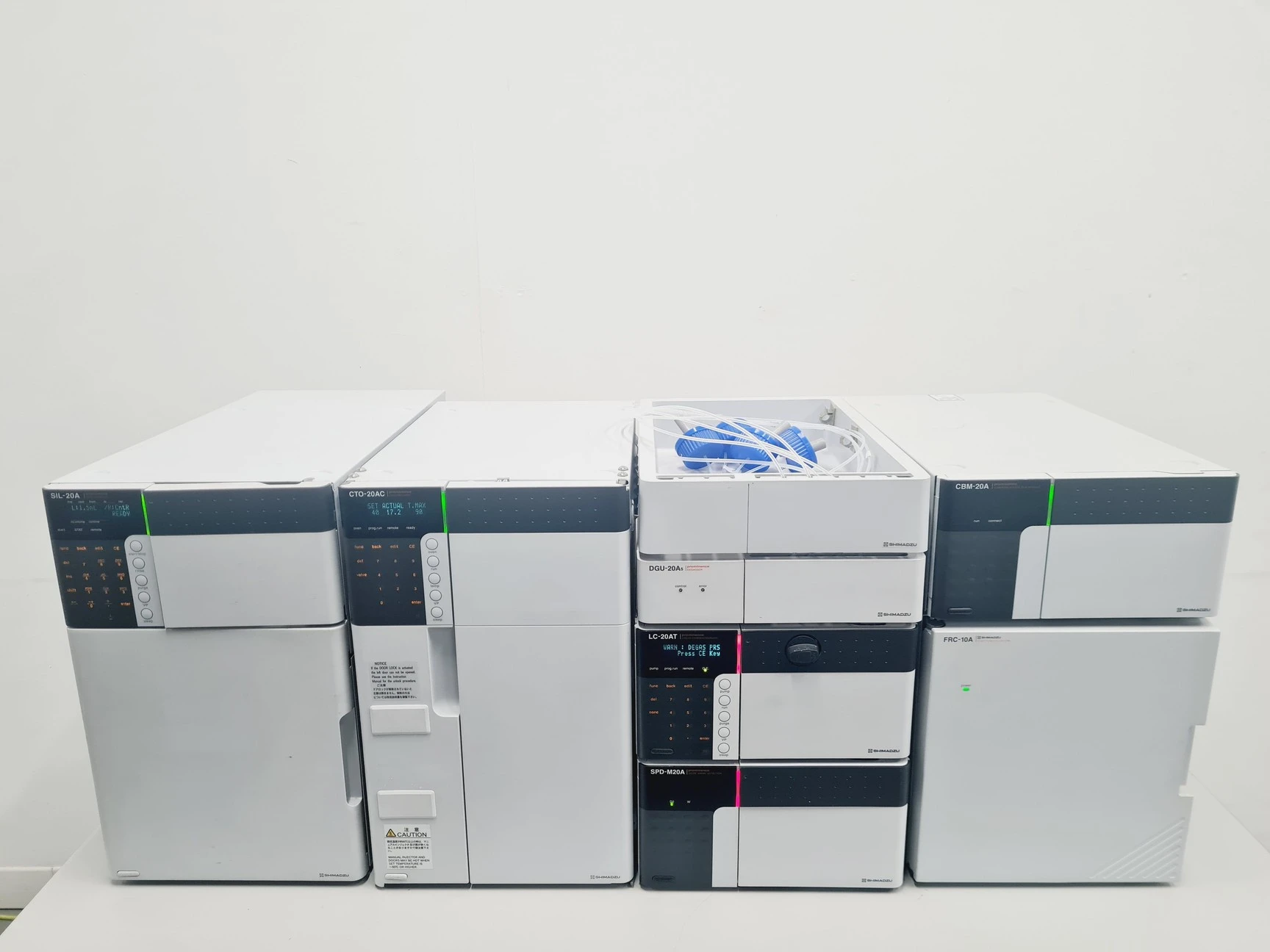 Shimadzu HPLC System with SIL-20A,CTO-20AC, SPD-M20A, LC-20AT, DGU-25A5 ...